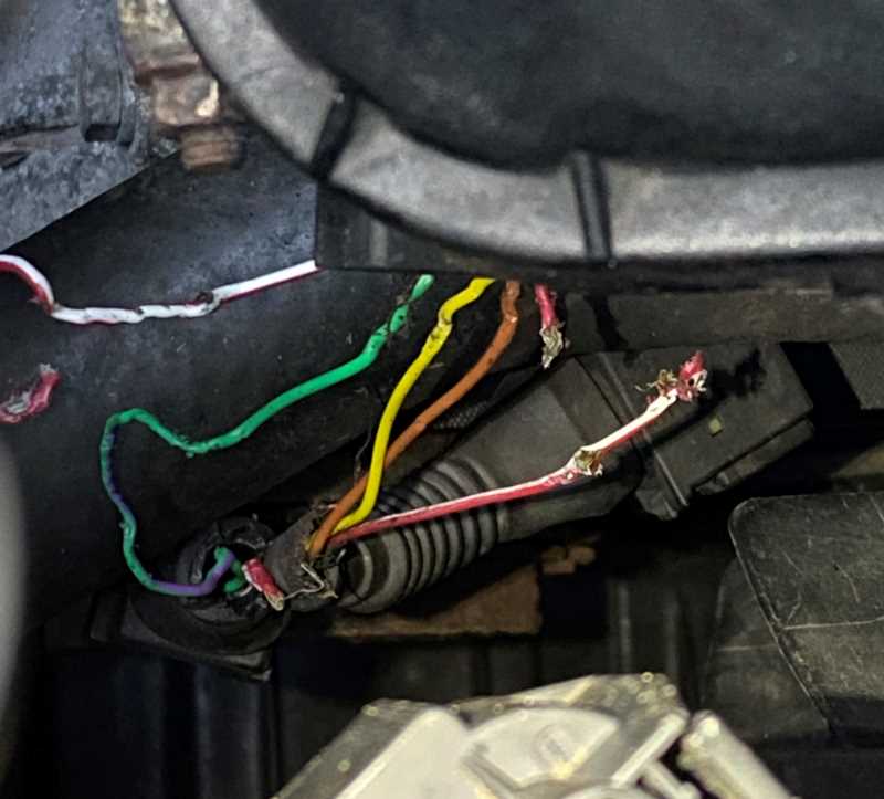 Damaged wires in engine compartment, still runs - Xoutpost.com